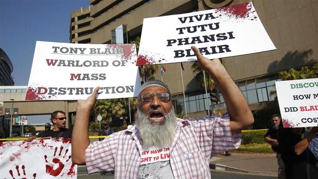 Tutu: Blair og Bush bør stilles for retten i Haag | Udland | DR